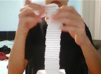 Tallest Domino Tower Stacked On A Toilet Paper Roll Placed Horizontally ...