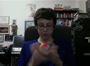 Fastest Time To Solve A Rubik's Cube While Singing Tom Lehrer's ...