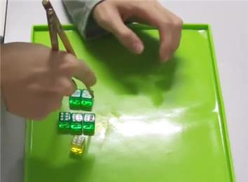 Fastest Time To Build A Three-Level Dice Pyramid Using Chopsticks ...