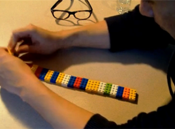 Most Lego Bricks Stacked Together In 15 Seconds | World Record | Louie Foxx