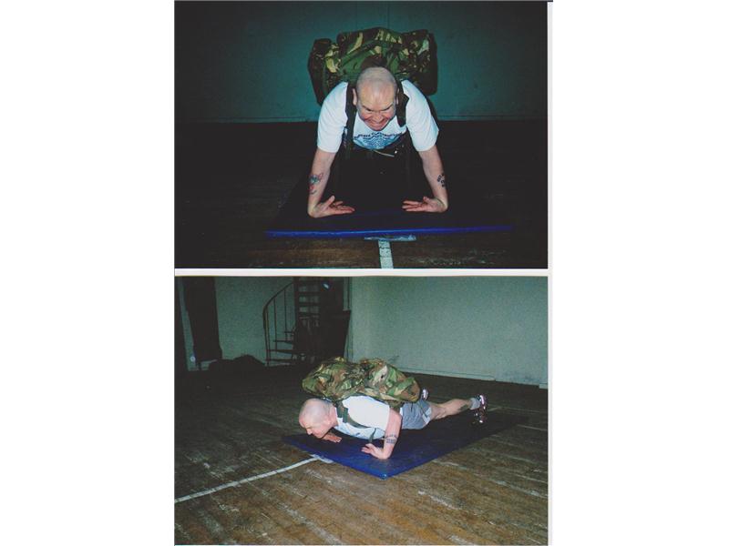 Most Back Of Hand Push-Ups While Wearing A 40-Pound Pack In One Minute ...