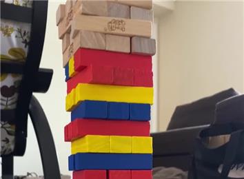 Most Jenga Blocks Balanced On A Single Die | World Record | Liz Nason