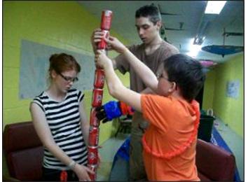 Tallest Soda Can Tower | World Record | Eric Collins