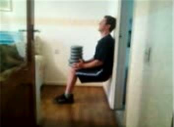 Longest Wall Sit While Carrying A 40-Pound Weight | World Record ...