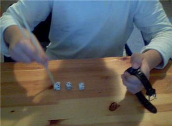 Fastest Time To Stack Three Dice Using Chopsticks | World Record | Vito O.