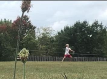 Longest Football Throw Into A Human Hoop | World Record | Landon McCoy