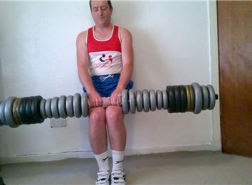 Longest Wall Sit While Carrying A 190-Pound Barbell | World Record ...