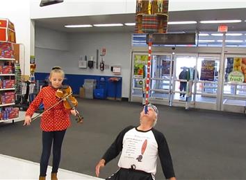 Longest Time Playing A Fiddle Beside Someone Balancing A Mechanical ...