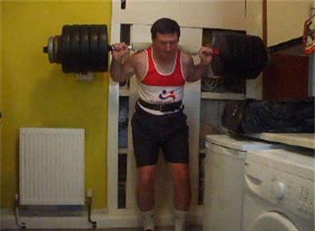 Longest Wall Sit While Carrying A 290-Pound Barbell On Shoulders ...