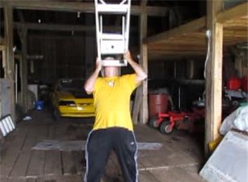 Longest Time Balancing A 12-Foot Step Ladder On Chin | World Record ...