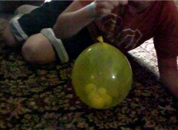 Most Golf Balls Fit Inside An Inflated Balloon | World Record | Ryan ...