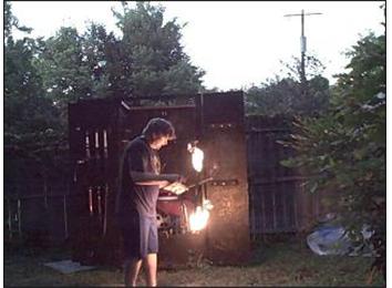 Longest Flaming Devil Stick Windmill | World Record | Brian Pankey