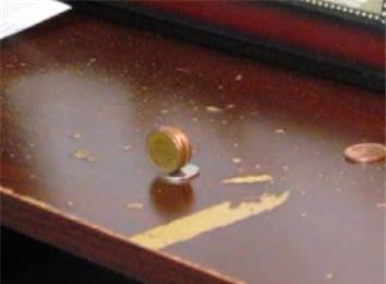 Most Pennies Balanced Vertically On A Dime | World Record | Doug McManaman