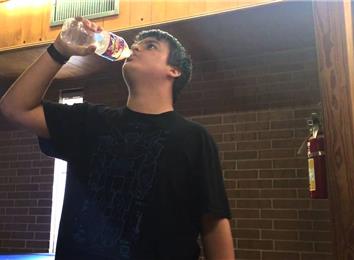 Fastest Time To Chug A 23.7-Ounce Water Bottle | World Record | Richard ...
