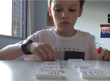 Fastest Time To Stack 10 Dominoes Into A Tower Using One Hand | World ...