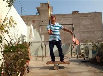 Longest Time Balancing A Baseball Bat On Thumb While Balancing On Rola ...