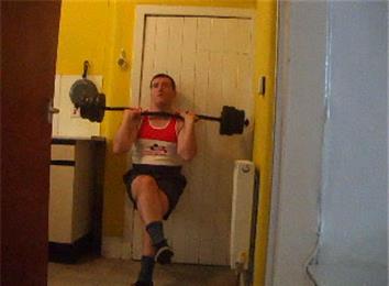 Longest One-Leg Wall Sit While Carrying A 35-Pound Z-Bell At Shoulder ...