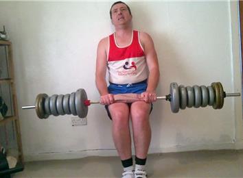 Longest Wall Sit While Carrying A 100-Pound Barbell | World Record ...