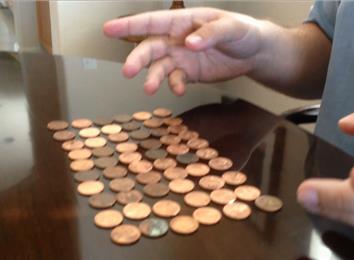 Tallest Penny Tower Stacked With Two Hands In One Minute | World Record ...