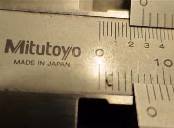 Smallest Paper Airplane | World Record | Reto Schläfli