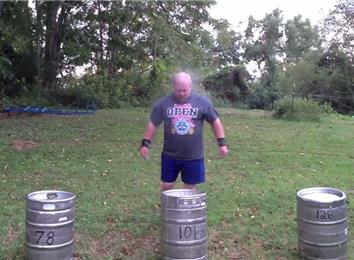 Most Reps Curling A 101-Pound Keg | World Record | Clint Poore