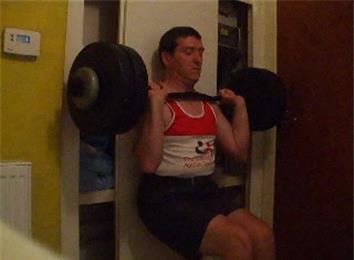 Longest Wall Sit While Carrying A 100-Pound Z-Bell At Shoulder Height ...
