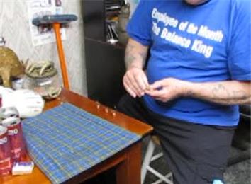 Tallest Penny Tower Stacked On Left Pinky Finger | World Record | Doug ...