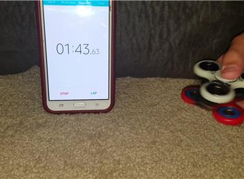 Longest Time Spinning Three Fidget Spinners In One Hand | World Record ...