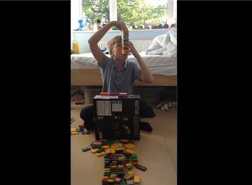 Tallest Domino Tower Stacked On A Domino Held Between Teeth | World ...