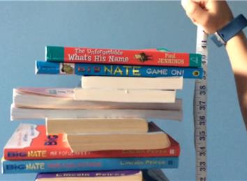 Tallest Paperback Book Tower | World Record | Marcus Brims