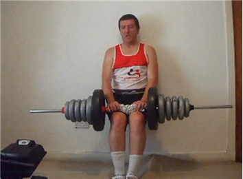 Longest Wall Sit While Carrying A 100-Pound Barbell | World Record ...