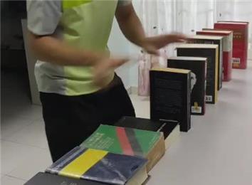 Fastest Time To Set Up And Topple 10 Books | World Record | KAI YI LIM