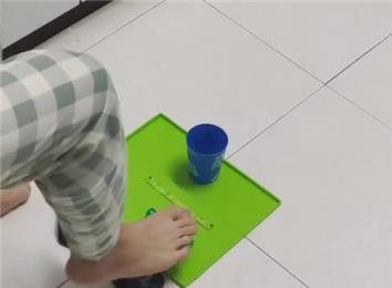 Fastest Time To Pick Up Three Dice And Place Them In A Plastic Cup ...