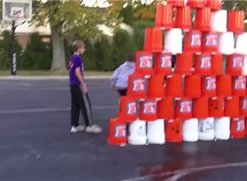 Tallest Five-Gallon Bucket Pyramid On An Outdoor Basketball Court ...