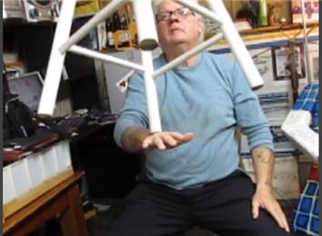 Longest Time To Balance A Hardwood Stool On Back Of Hand | World Record ...