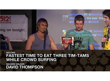 Fastest Time To Eat Three Tim Tams While Crowd Surfing | World Record ...