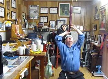 Longest Time Balancing An Umbrella On Forehead While Kneeling | World ...