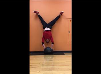 Longest Handstand On A Swiss Ball Against A Wall | World Record | Tyler ...