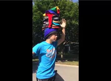 Most Hats Worn While Riding A Unicycle | World Record | Kevin Hong