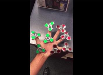 Most Fidget Spinners Spinning On One Hand | World Record | Jimmy Pockets